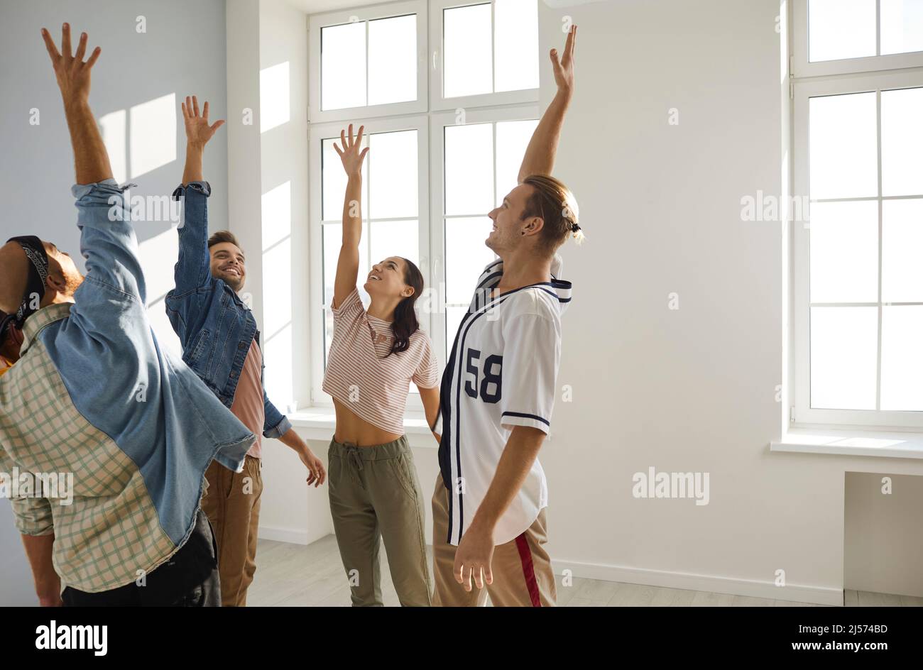 Smiling diverse people train dance in studio Stock Photo - Alamy