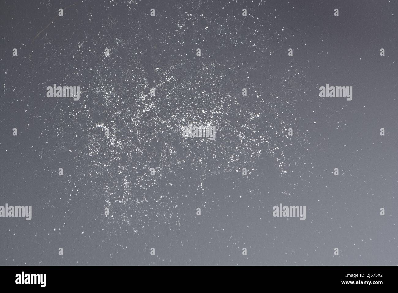 Sugar crystals strewn on grey background. Pattern. Texture Stock Photo ...