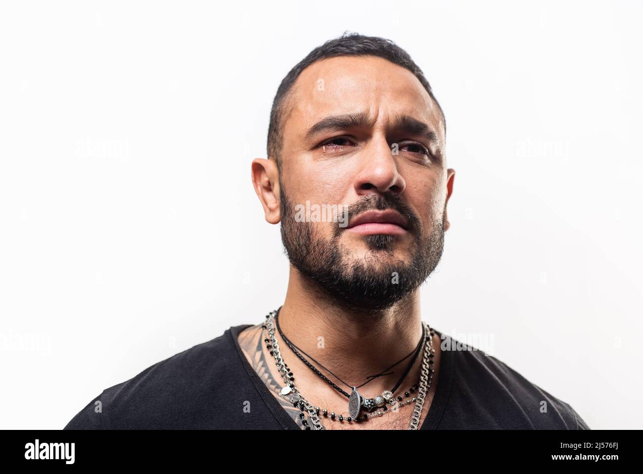 Lonely single man. Hispanic guy feeling lonely and melancholy. Sad face ...