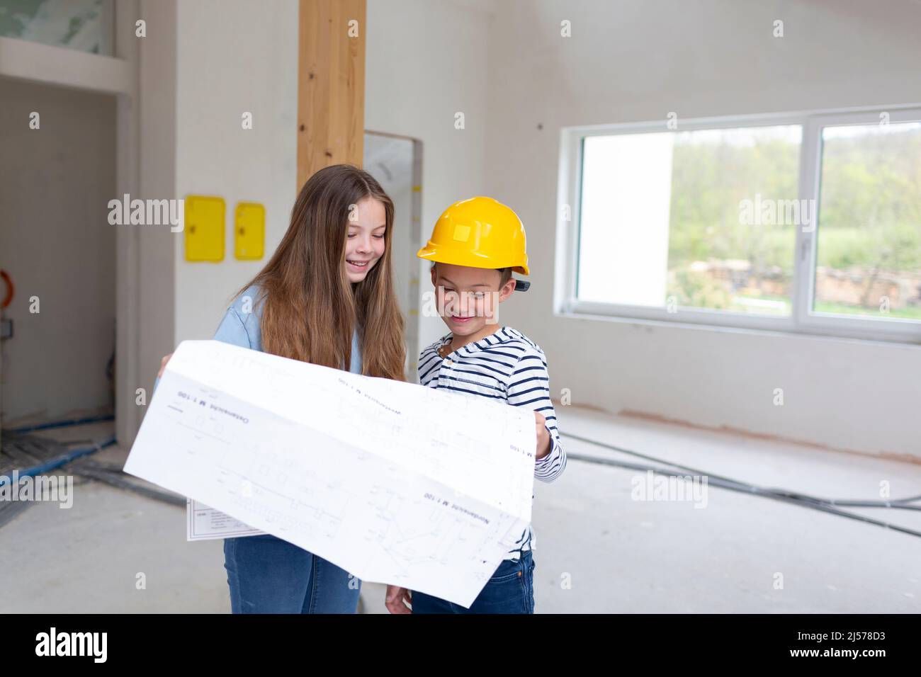 Brother and sister are on the construction site of their new room loft ...
