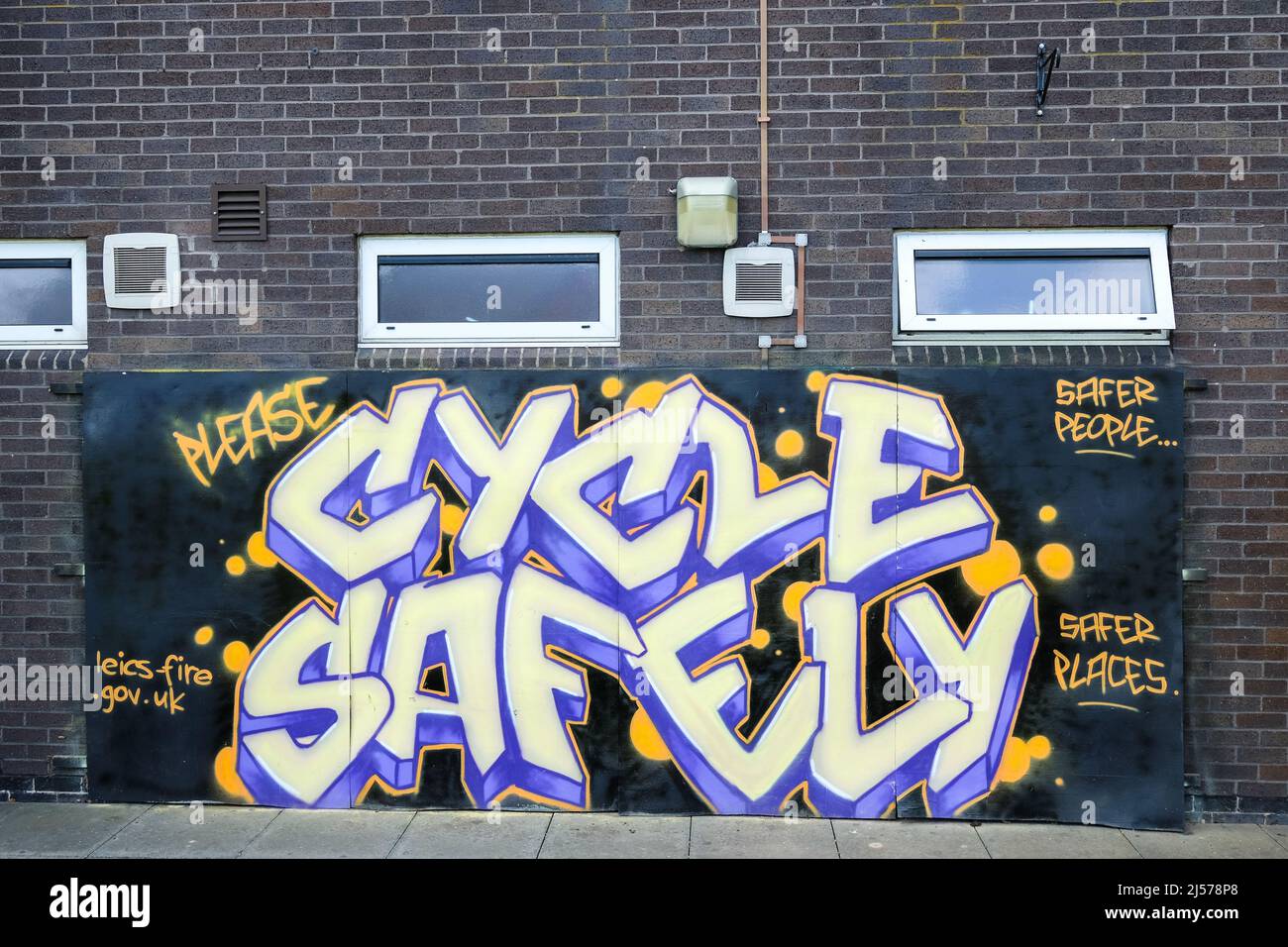 cycle safety message painted on board Stock Photo - Alamy