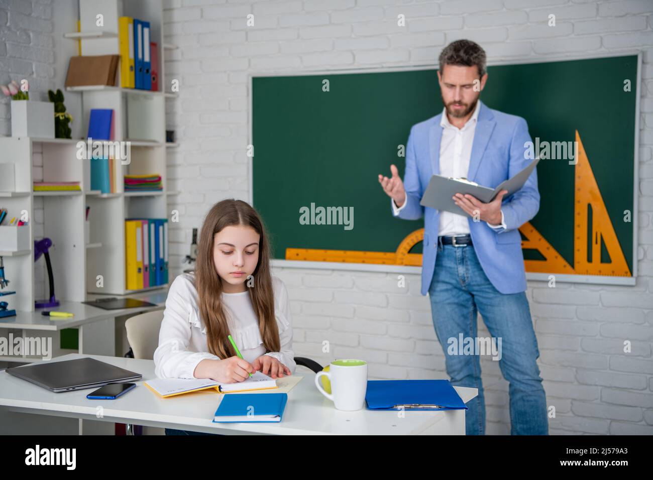 child study in classroom with teacher. selective focus Stock Photo - Alamy