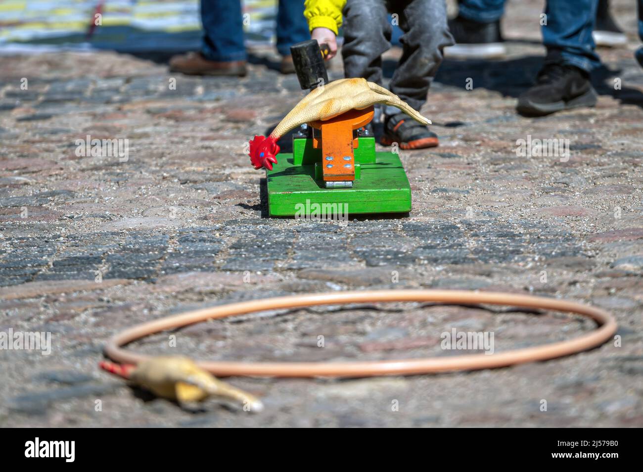 Easter holidays, games for kids in the city square, a toy target hit ...