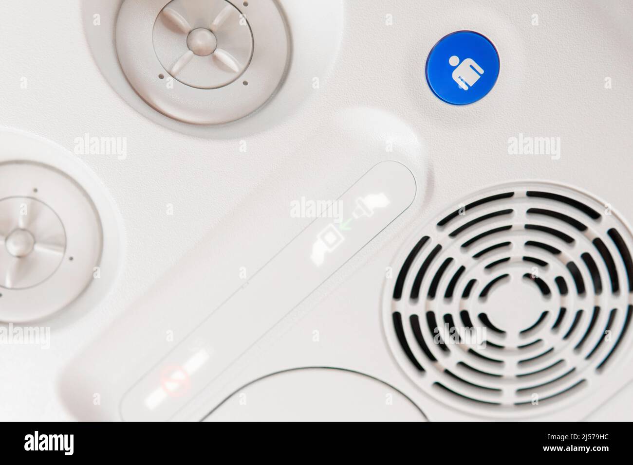 Overhead panel passenger service unit in an aircraft Stock Photo - Alamy