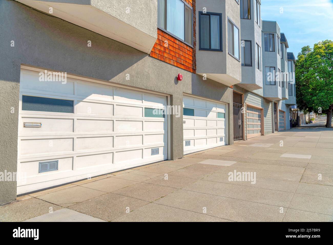 Townhouses' garage exterior at San Francisco, California. Townhomes ...