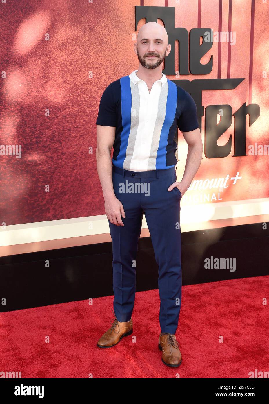 Jesse Scott Egan walking on the red carpet at the Los Angeles Premiere ...