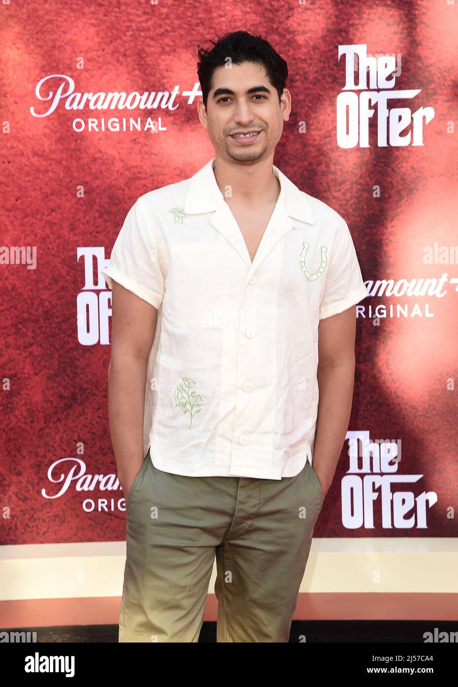 Alexander Flores walking on the red carpet at the Los Angeles Premiere ...