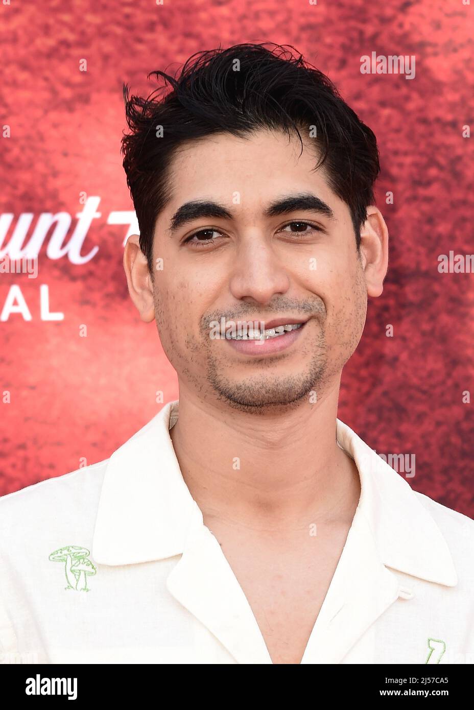 Alexander Flores walking on the red carpet at the Los Angeles Premiere ...