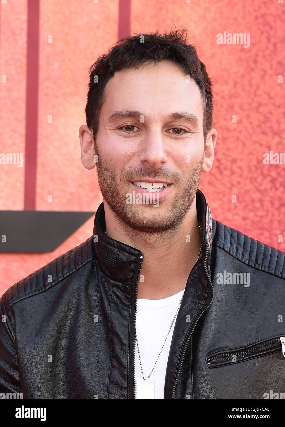 Jake Hunter walking on the red carpet at the Los Angeles Premiere of ...