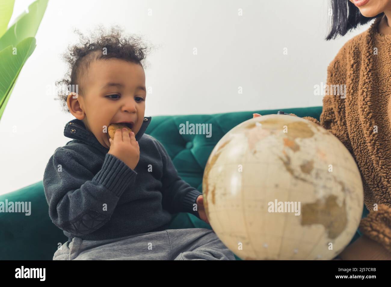 One small boy eating cookie hi-res stock photography and images - Alamy