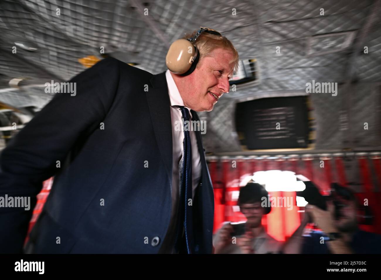 Prime Minister Boris Johnson boards an Indian military Chinook ...