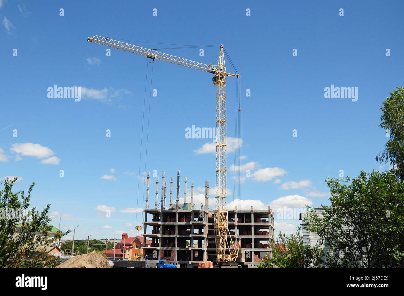 Building crane hook and building house under construction Stock Photo ...