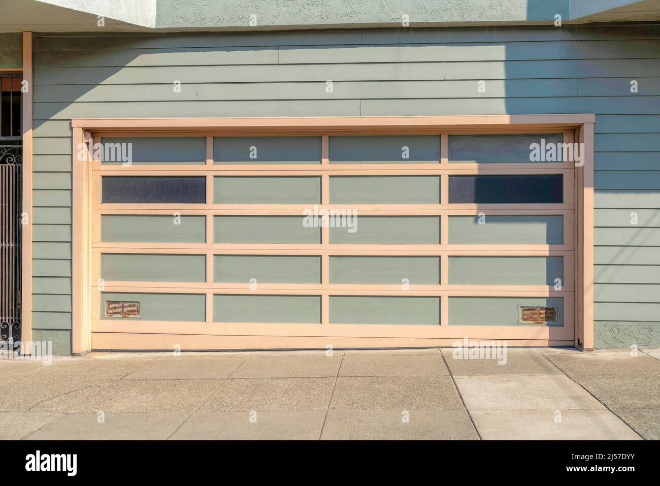 Attached garage exterior with greenish gray tones at San Francisco ...