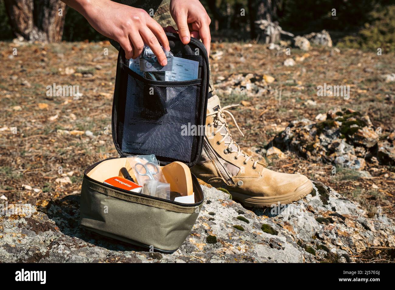 Military army first aid kit. Camouflaged soldier medic Stock Photo - Alamy