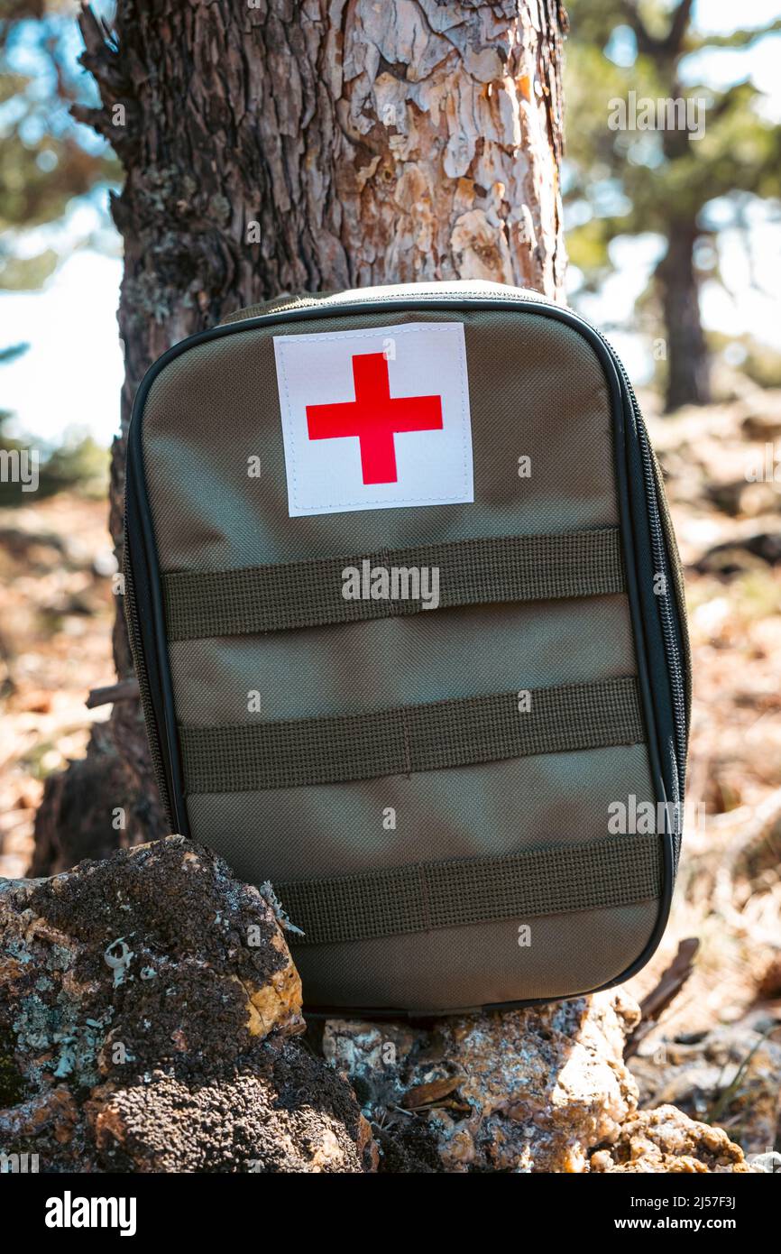 Military army first aid kit. White and red first aid sign Stock Photo ...