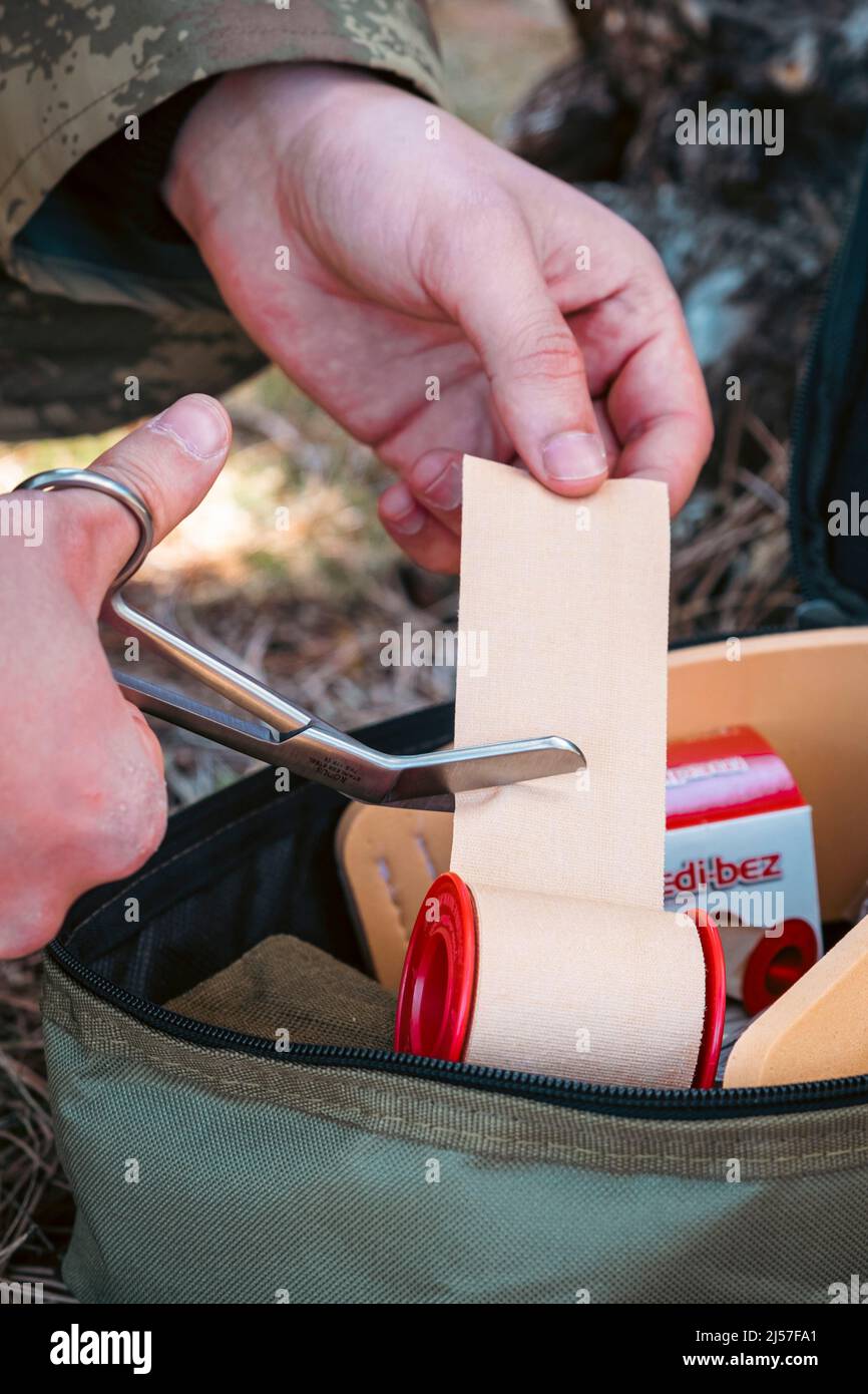 Military army first aid kit. Camouflaged soldier medic Stock Photo - Alamy