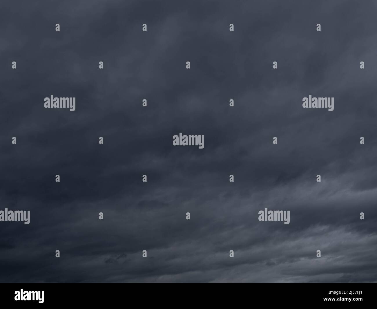 Clearly overcast skies. Dark, sinister clouds, dark blue in color ...