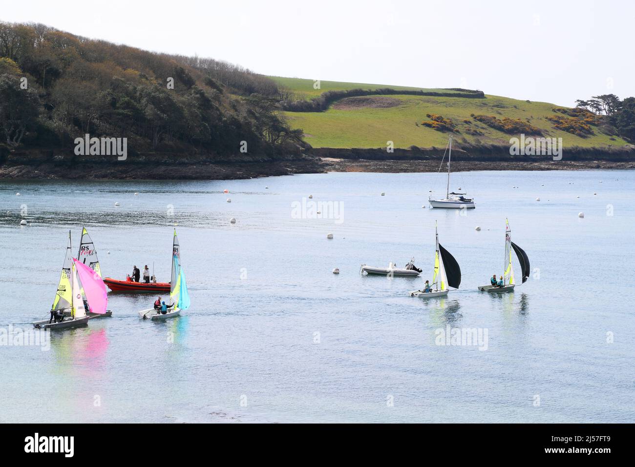 A group of small sailing dinghies near the harbour of St Mawes ...