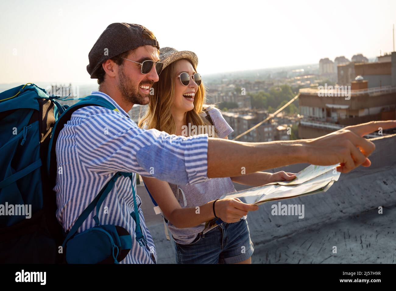 Holiday travel people tourism concept. Smiling couple having fun and ...