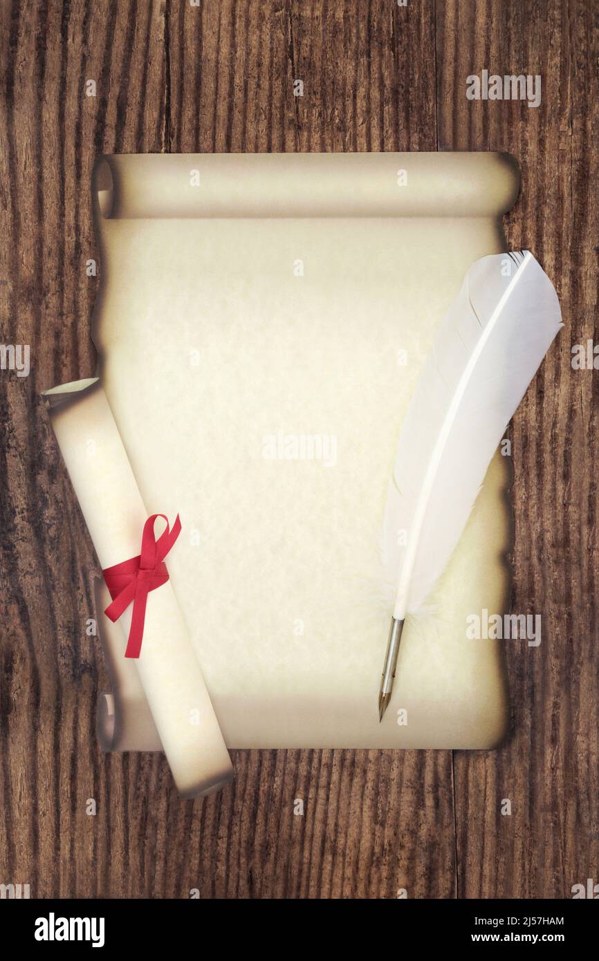 Parchment paper scroll with feather quill pen and rolled scroll on ...