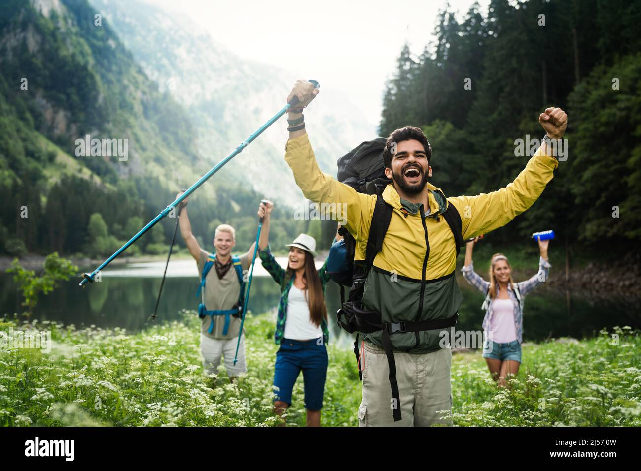 Group of happy hiker friends trekking as part of healthy lifestyle ...