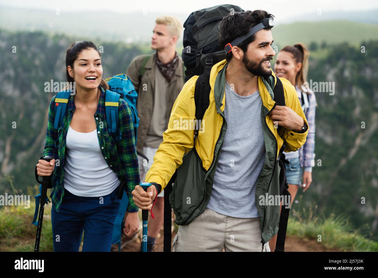 Group of happy hiker friends trekking as part of healthy lifestyle ...
