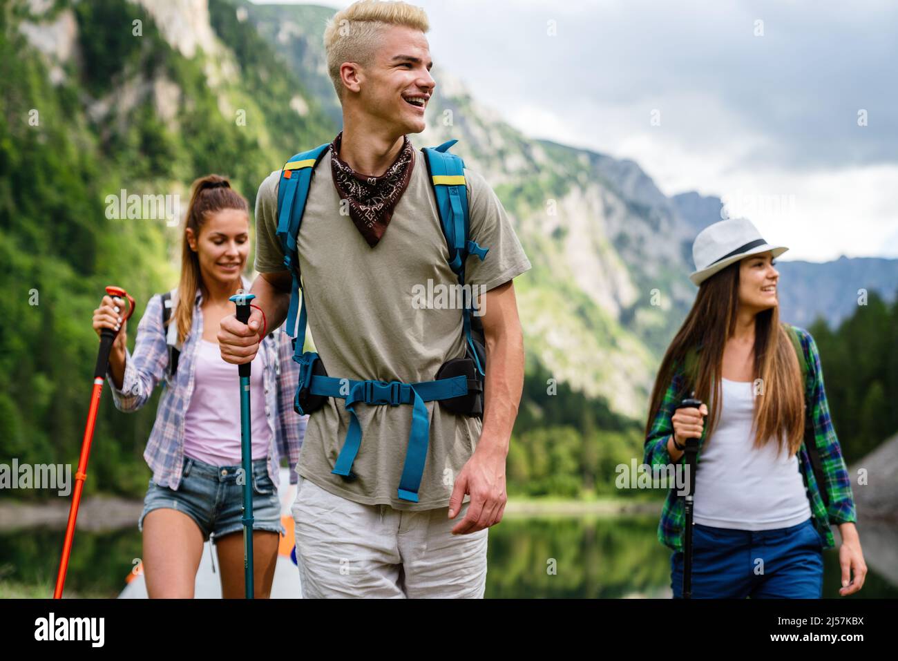 Group of happy friends enjoying outdoor activity together Stock Photo ...