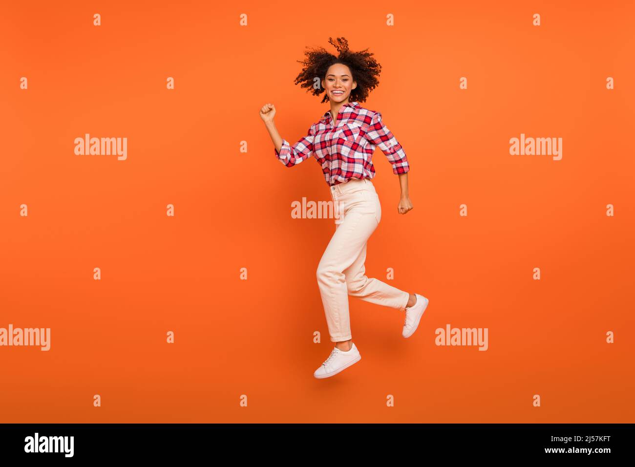 Full length body size view of attractive cheery sporty girl jumping ...
