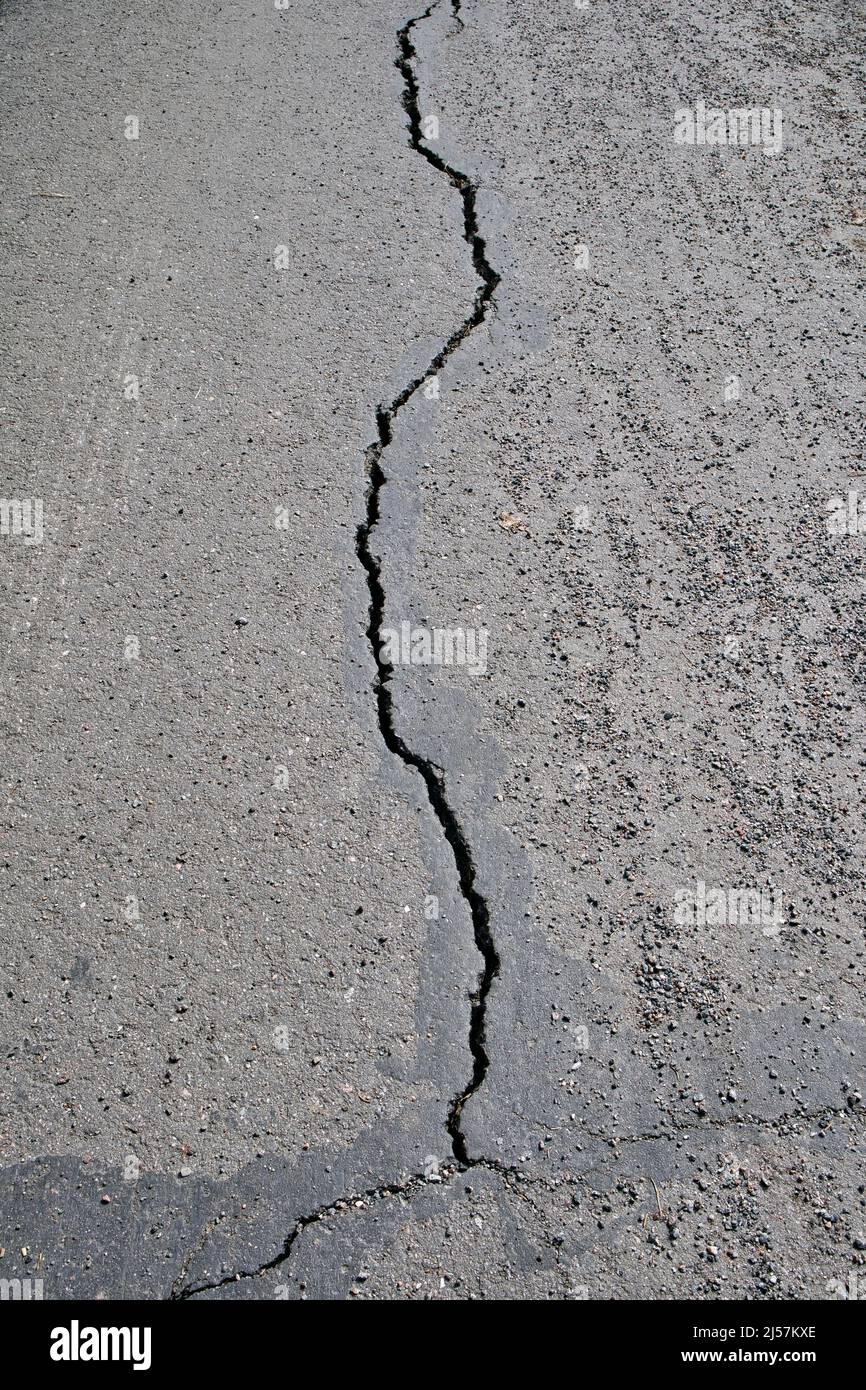 cracked asphalt road surface texture Stock Photo - Alamy