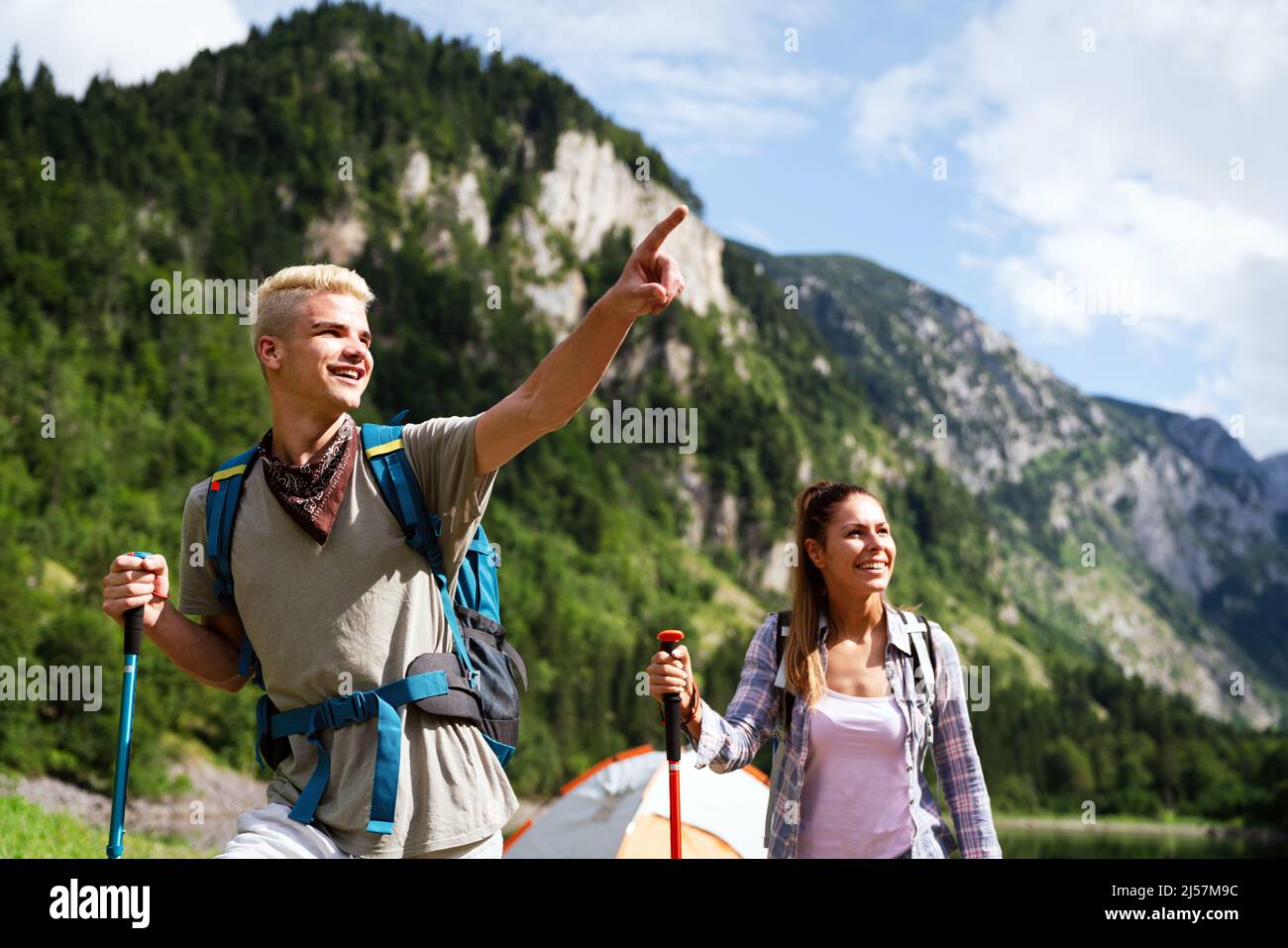 Happy hiker group of friends trekking as part of healthy lifestyle ...