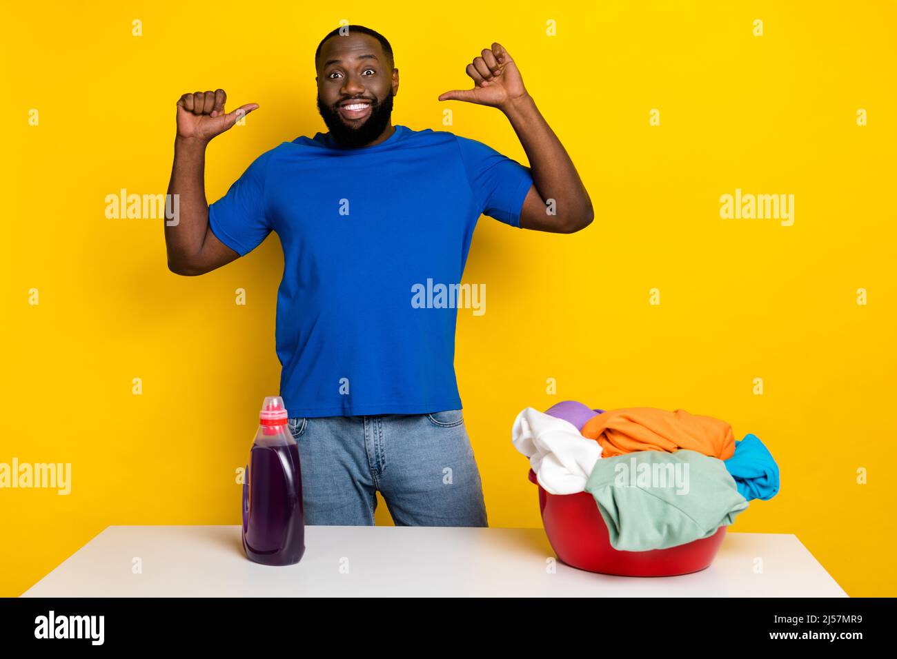 Portrait of handsome trendy cheerful lucky guy demonstrating himself ...