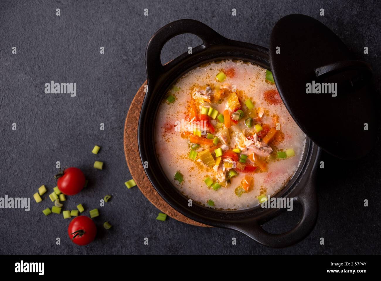 Salmon fish soup with vegetables, hot healthy meal Stock Photo - Alamy
