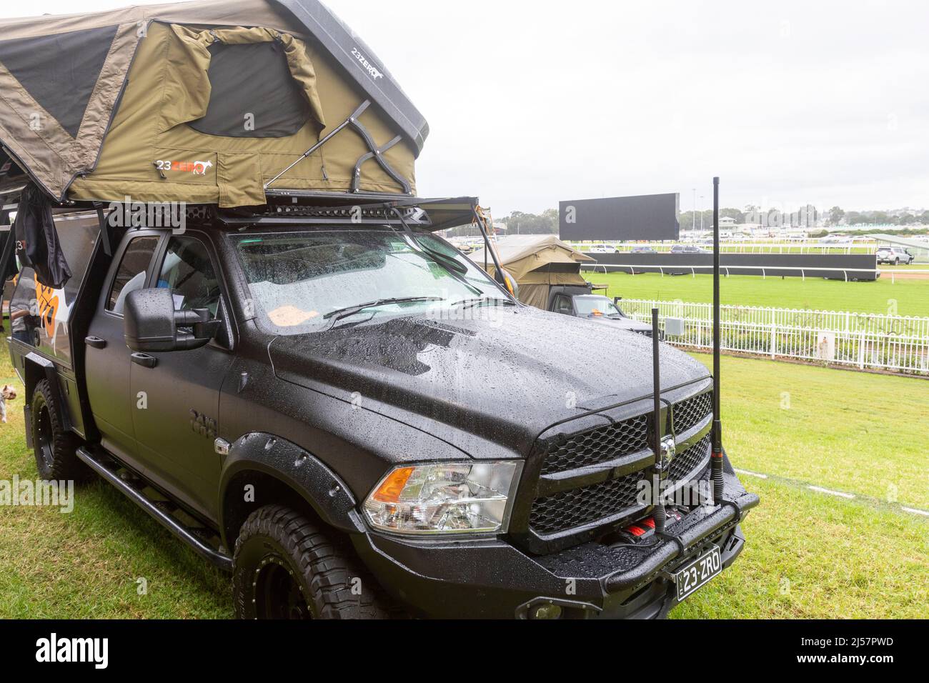 Rooftop tent by 23 zero displayed on roof of a RAM utility truck ...