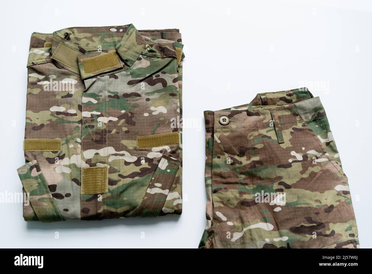 Top view of military uniform on white background Stock Photo - Alamy