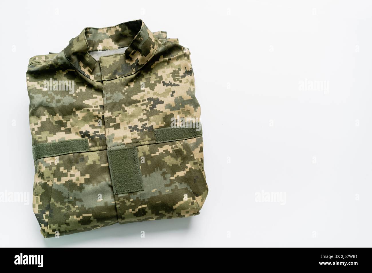 Top view of military uniform on white background Stock Photo - Alamy