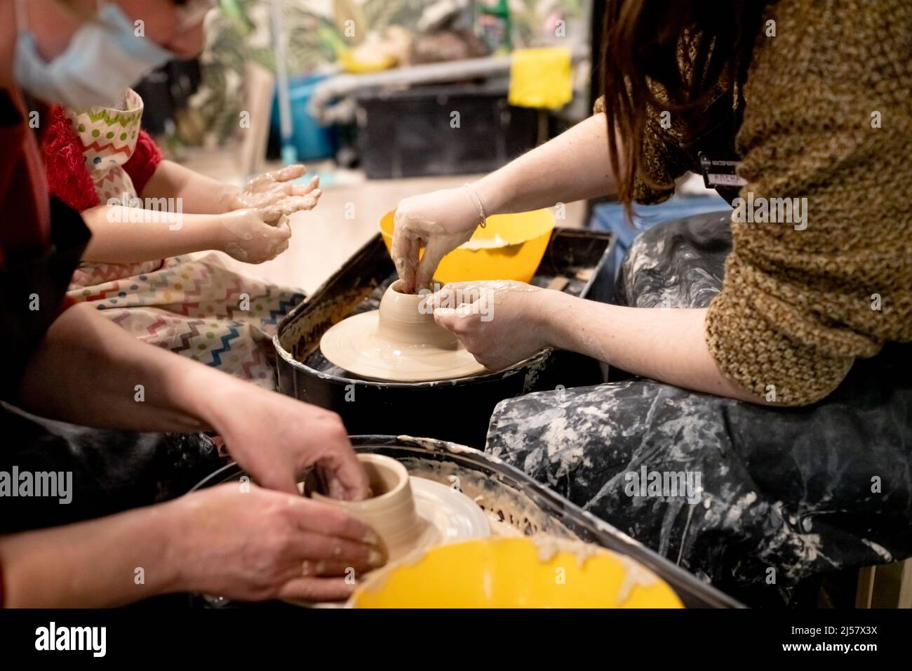 Modeling by hand. Potter's wheel. Pottery workshop Stock Photo - Alamy