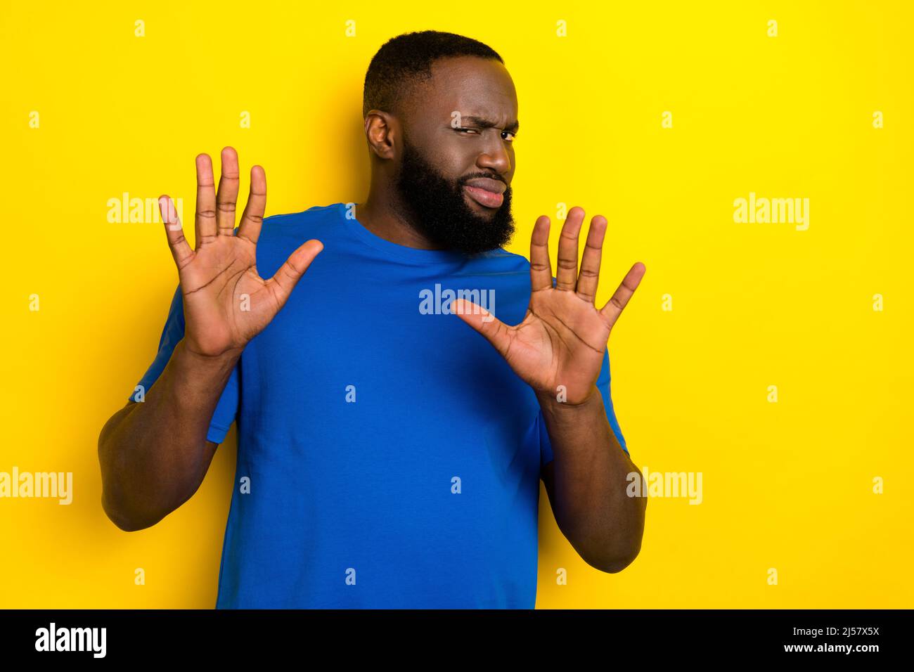 Portrait of attractive skeptic guy showing no answer unpleasant refuse ...