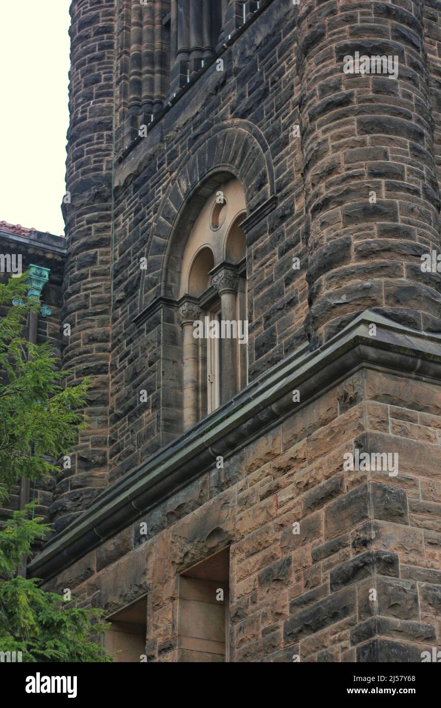 Vintage stone tower in the medieval Gothic style Stock Photo - Alamy