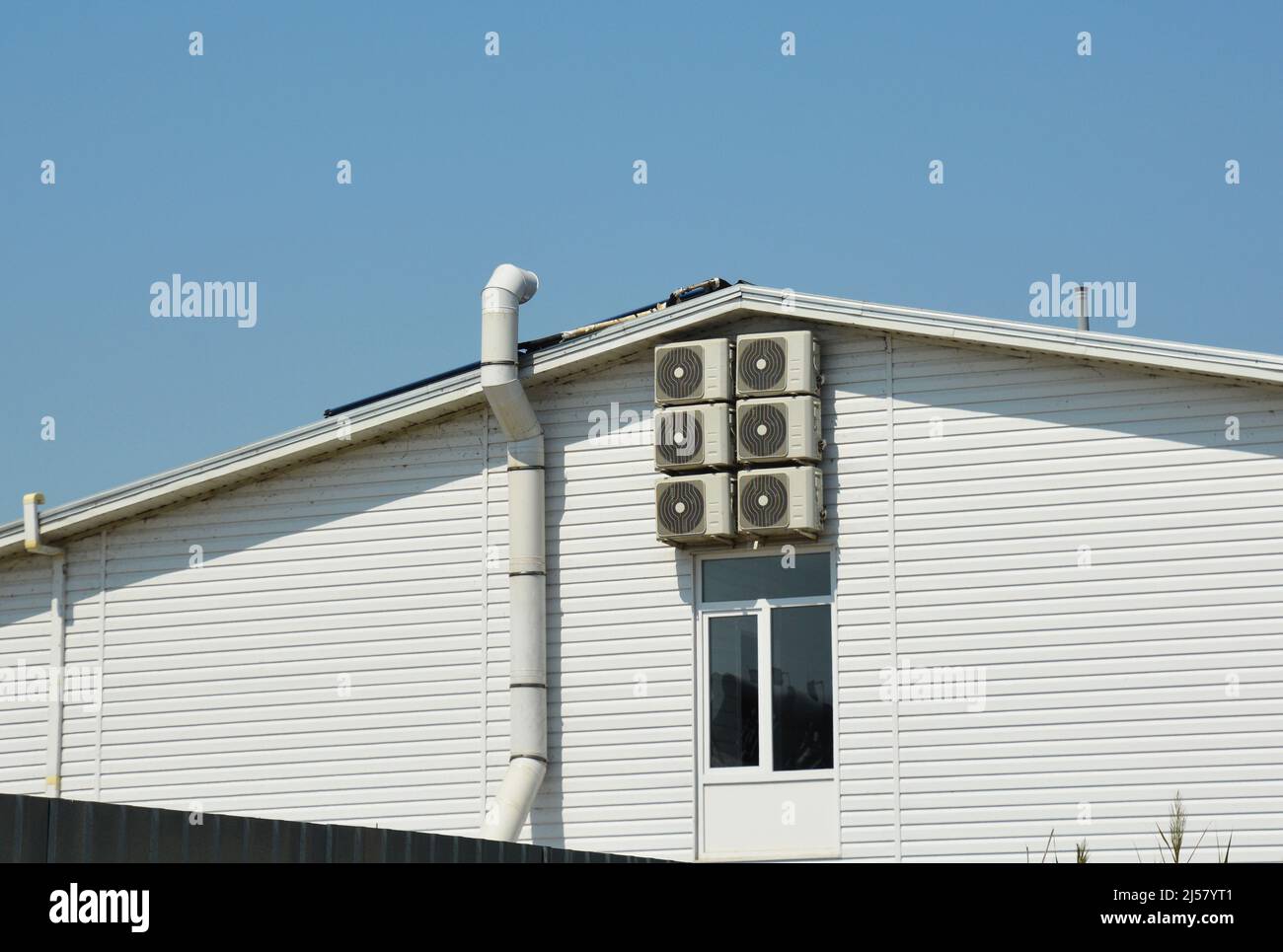 Ventilation systen on siding house construction with air compresors and ...