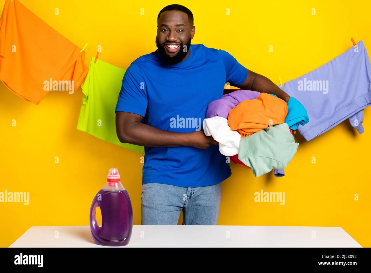 Hand washing garment in bowl hi-res stock photography and images - Alamy