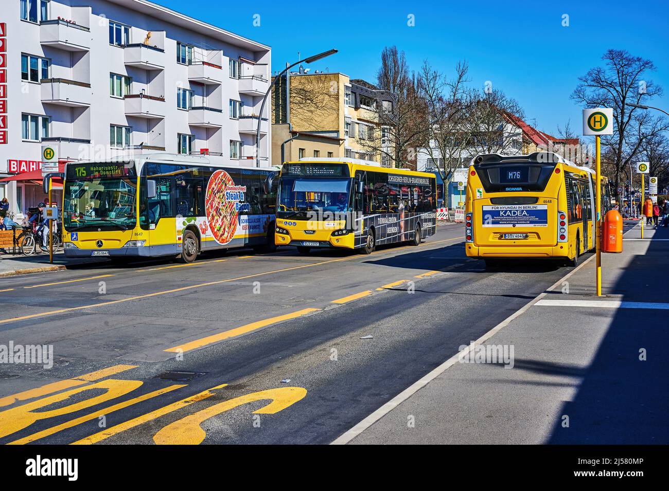 Berlin, Germany - March 22, 2022: Street scene at a bus stop in a small ...