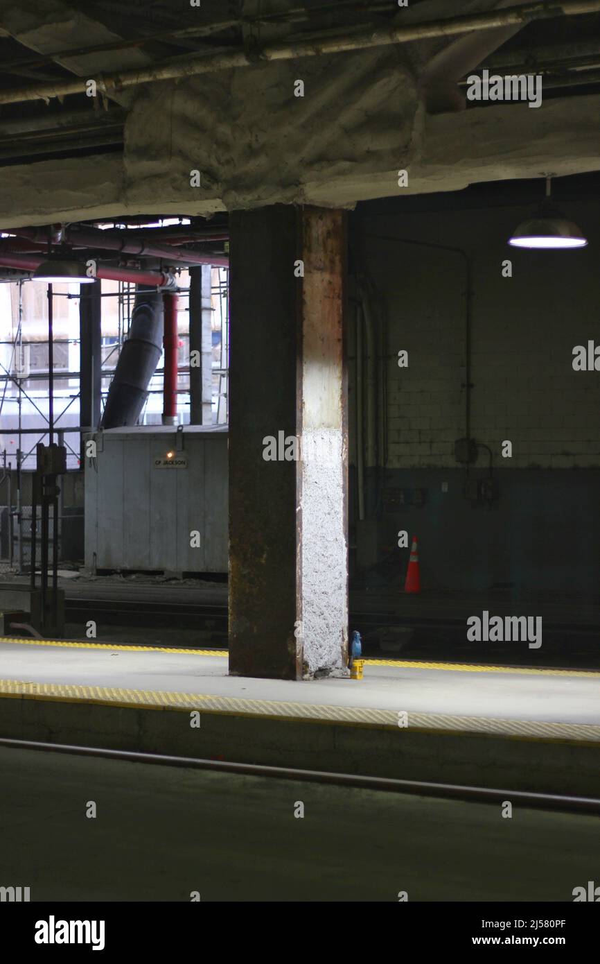 Simple foundation column standing on the public train platform in the ...