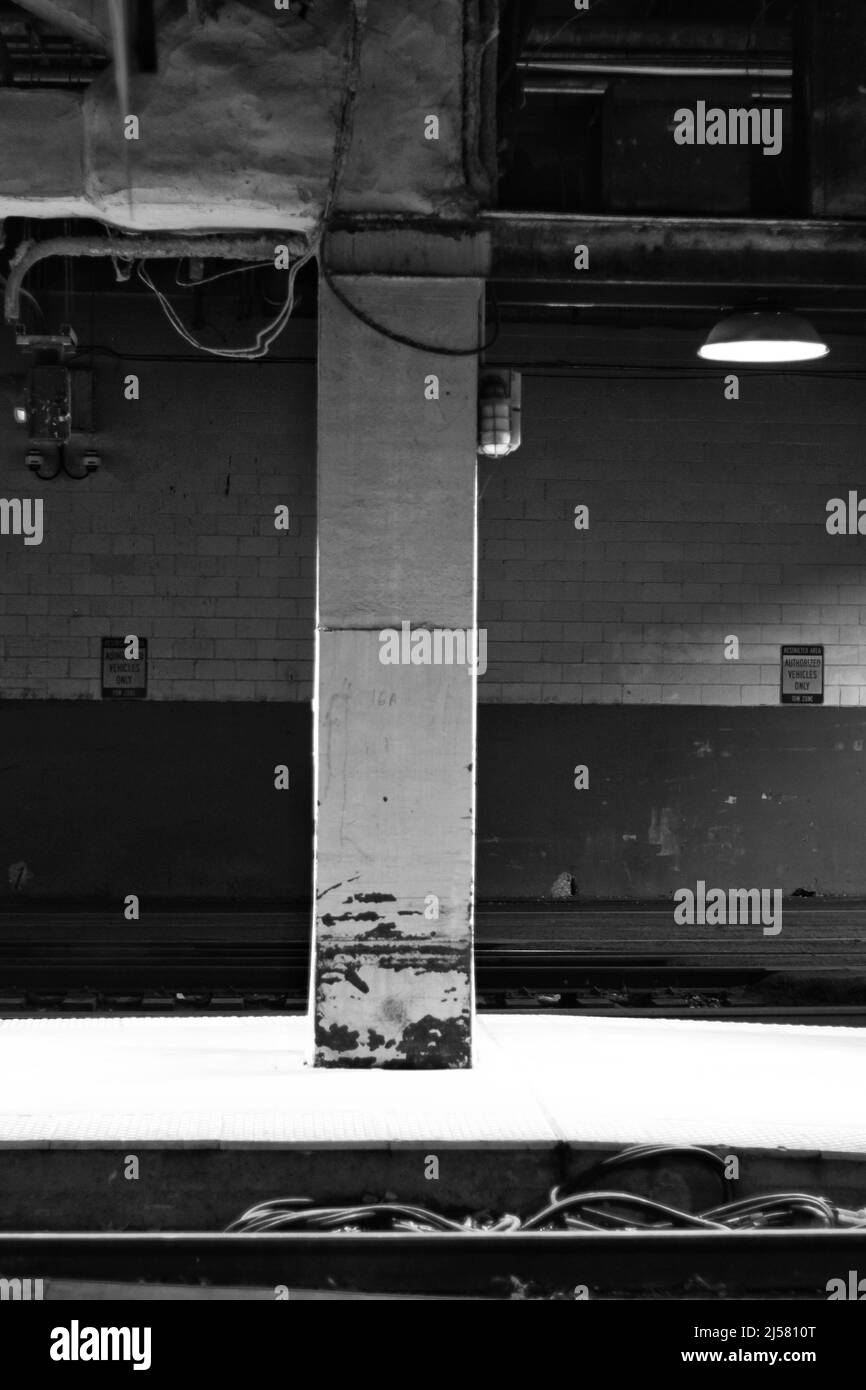 Simple foundation column standing on the public train platform in the ...