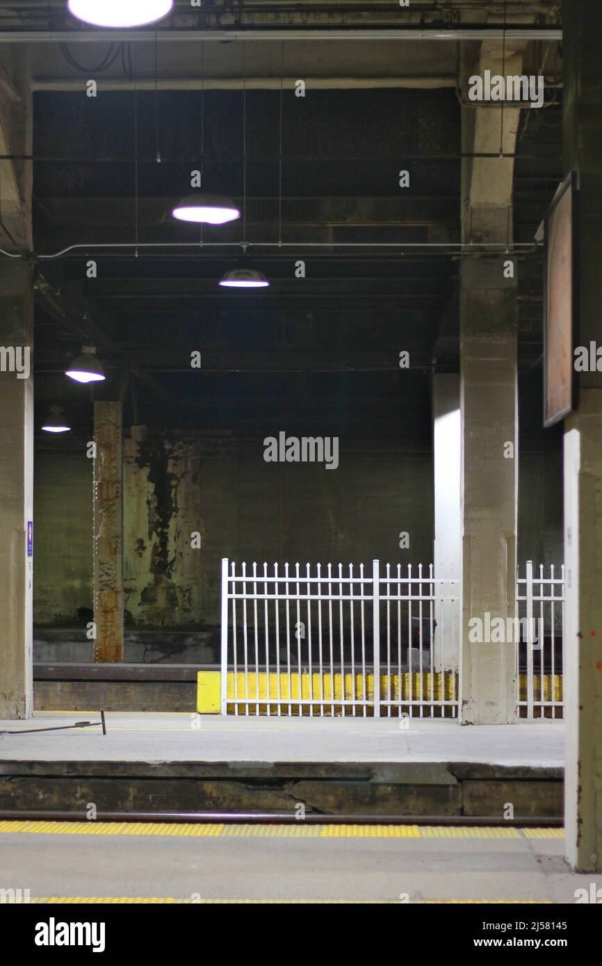 Simple foundation column standing on the public train platform in the ...