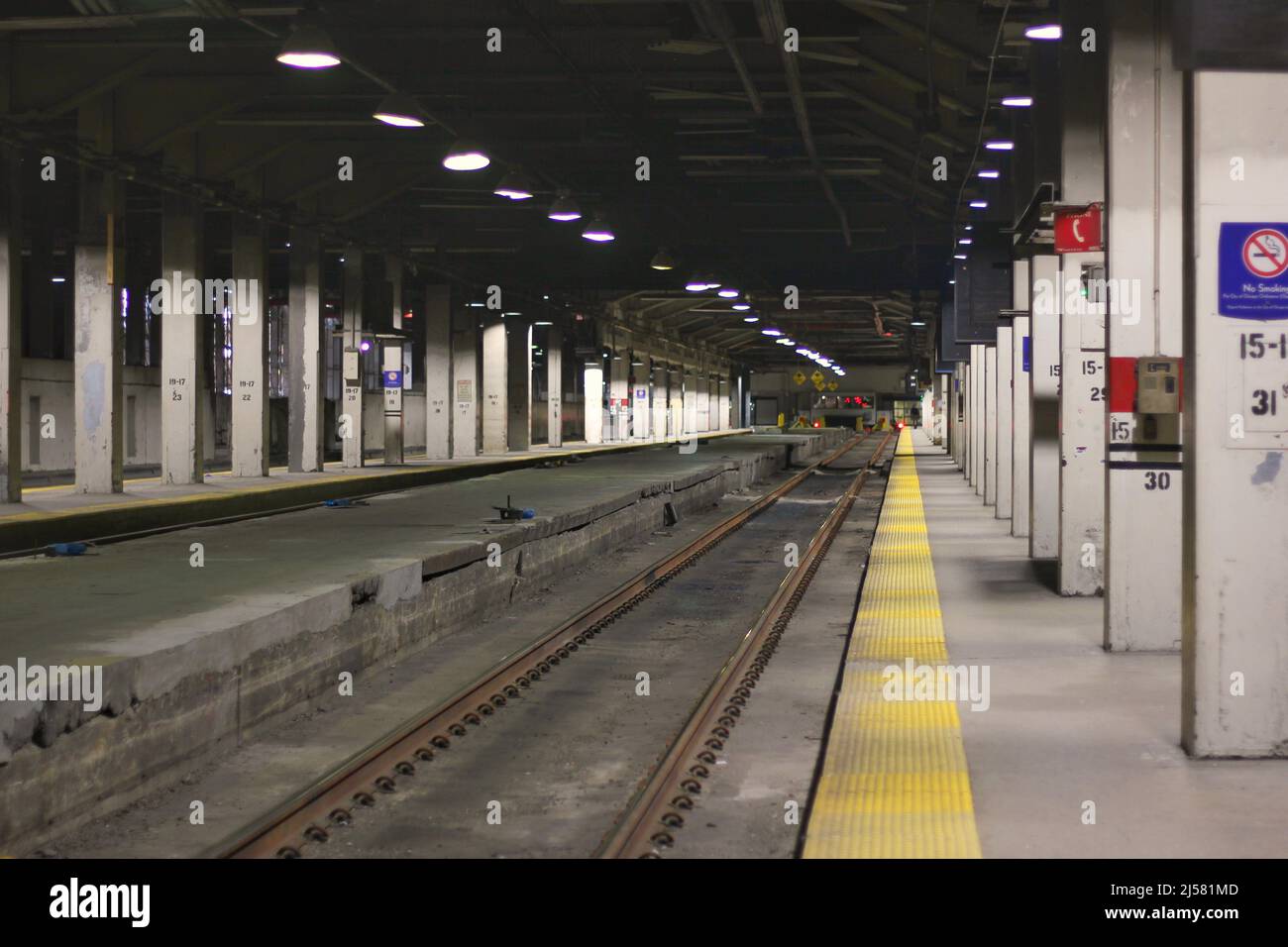 Railroad tracks in an underground transportation industrial facility ...