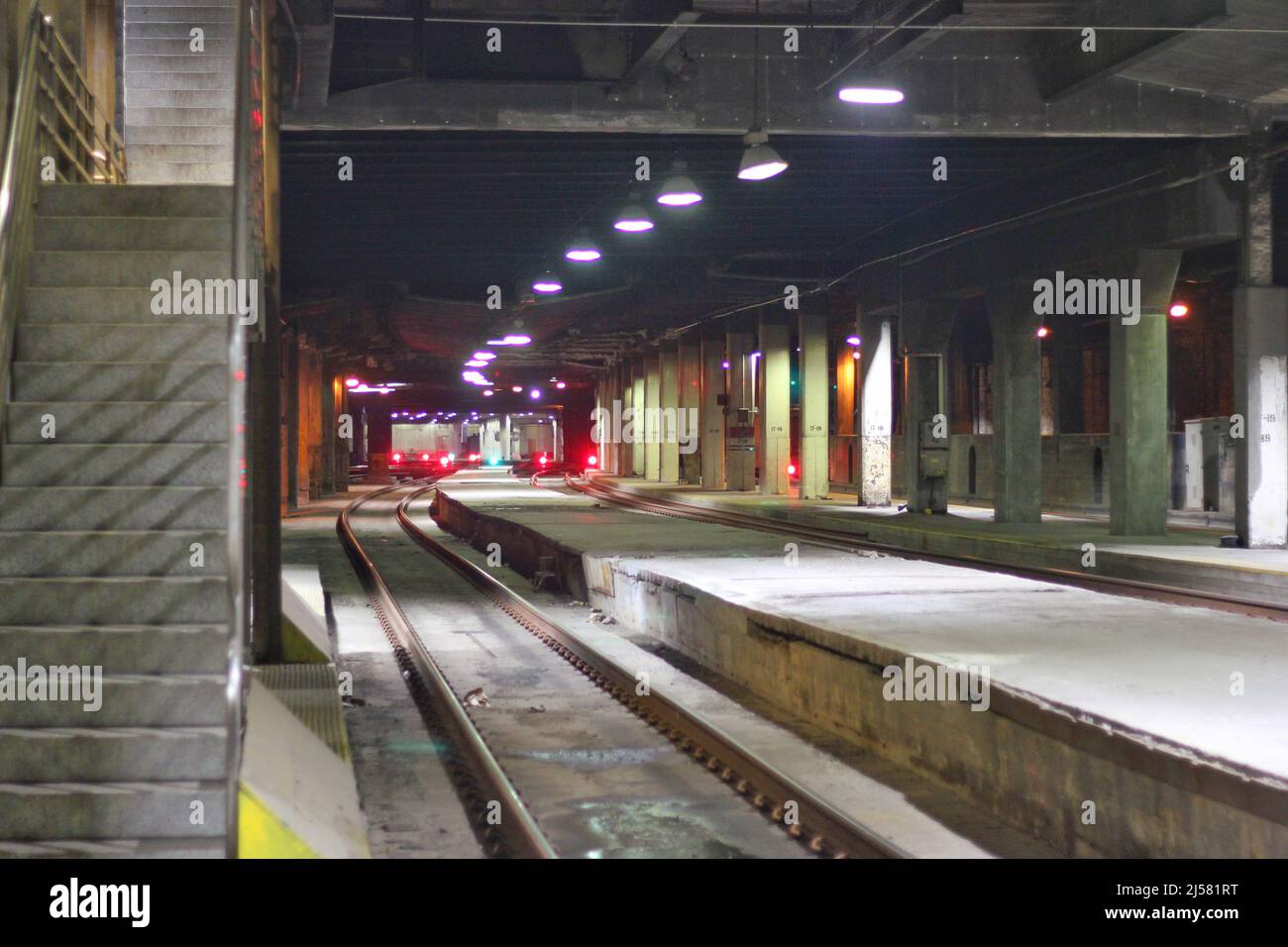 Railroad tracks in an underground transportation industrial facility ...