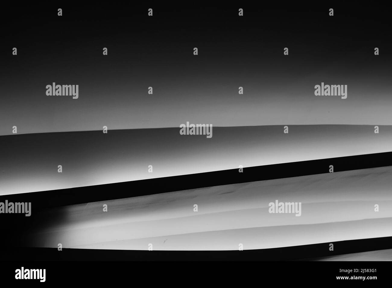 Abstract minimal lines of bright light verses a contrasting darkness in ...