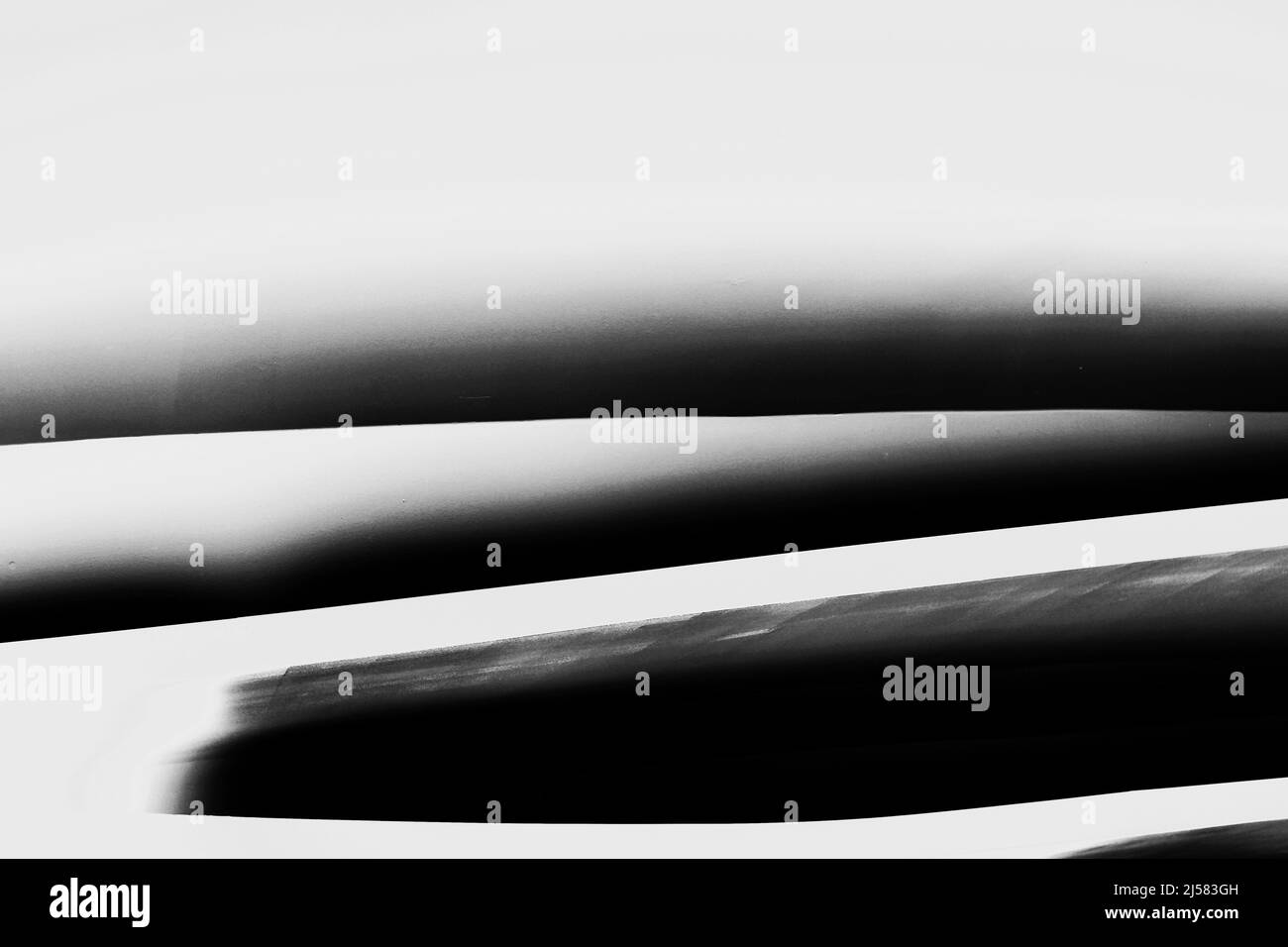 Abstract minimal lines of bright light verses a contrasting darkness in ...