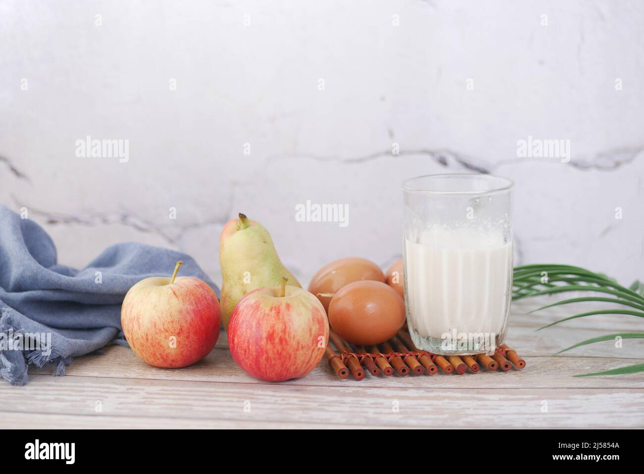 glass of milk, egg, and apple for morning breakfast Stock Photo - Alamy