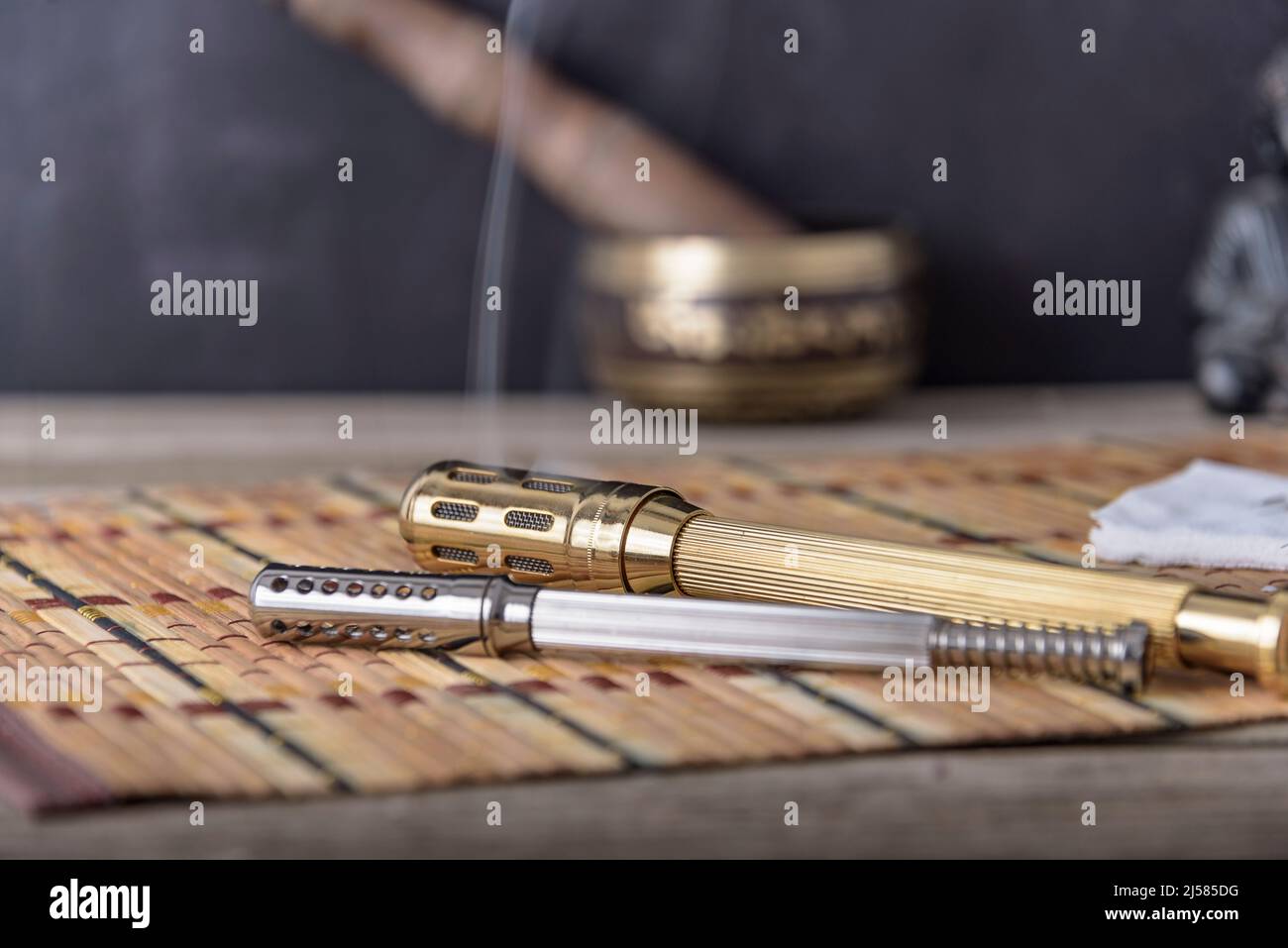 Chinese copper moxibustion box with smoke on bamboo Stock Photo - Alamy